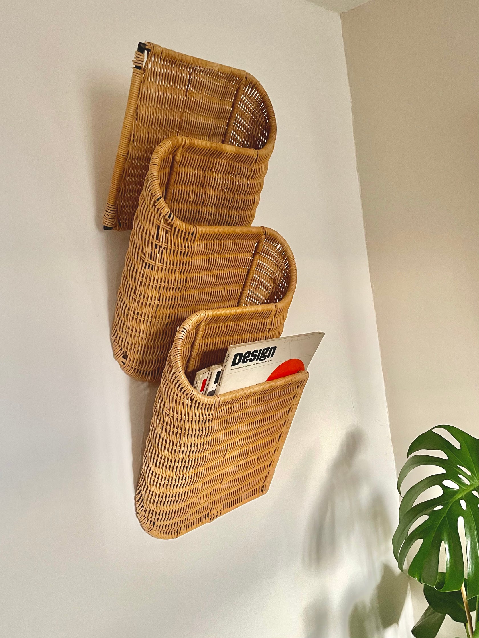 Wavy wall mounted wicker magazine rack circa 1970 – Zoo Lane