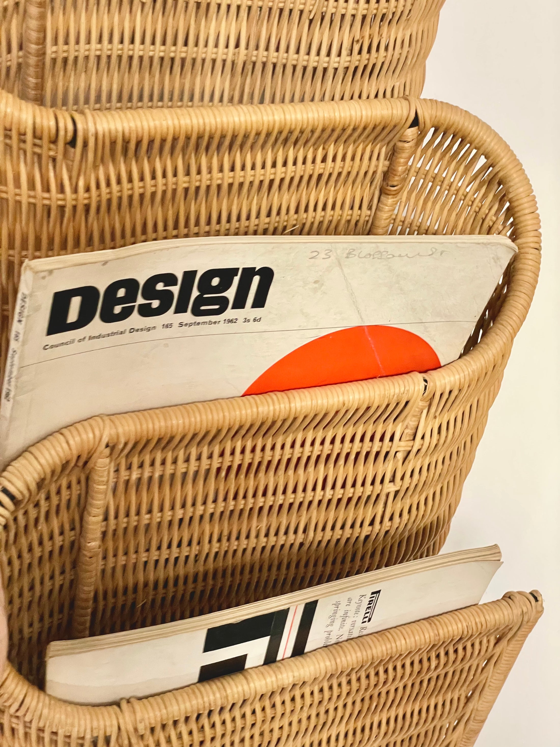 Wavy wall mounted wicker magazine rack circa 1970 – Zoo Lane